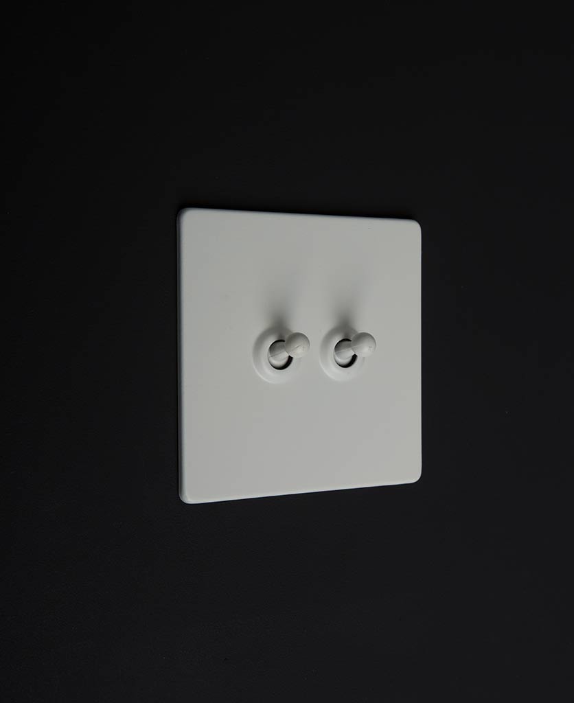 White Toggle Light Switch with Black, White Gold, Silver Toggles
